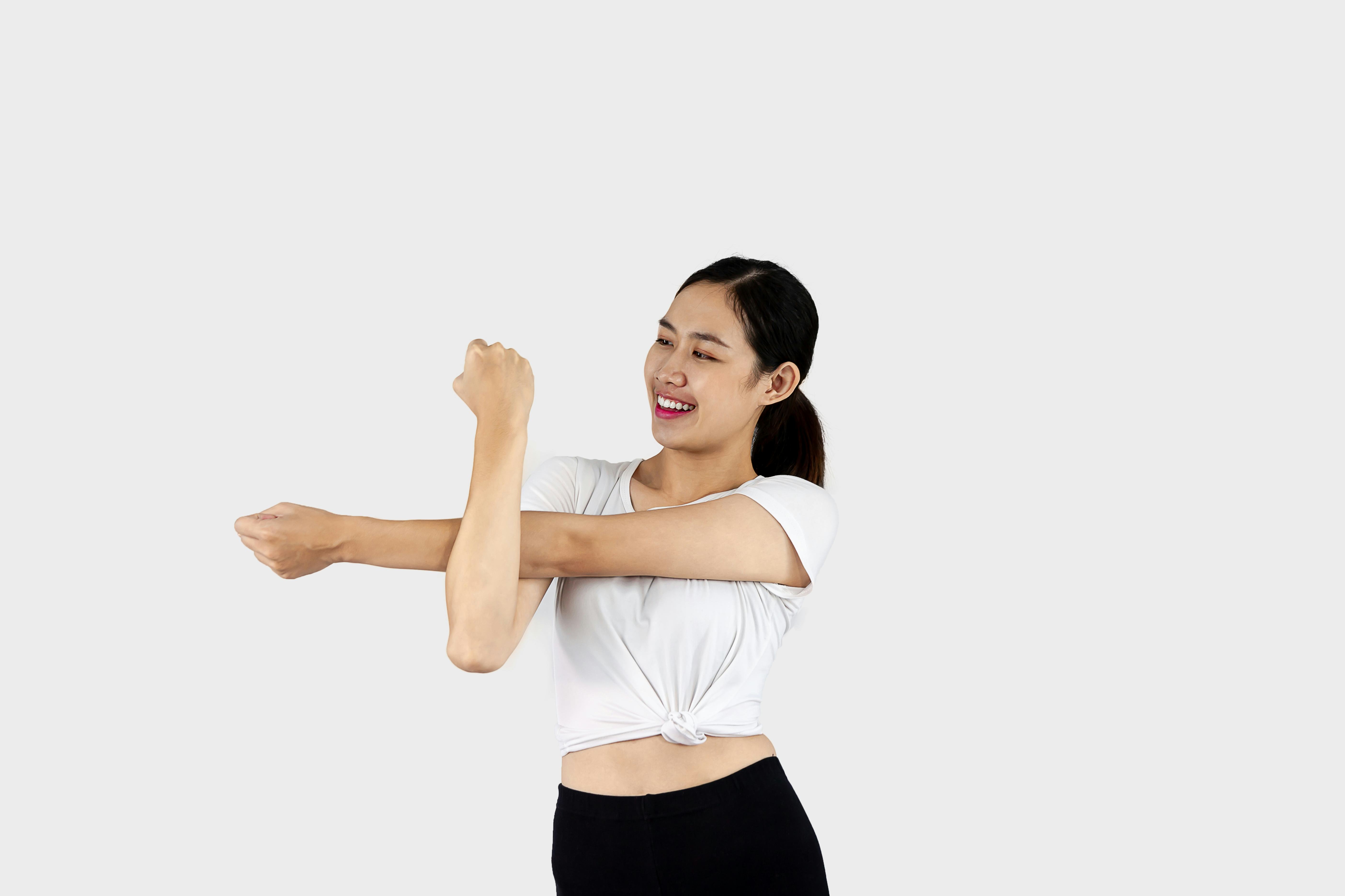 11 Stretches For Mid-Back Pain, According To Experts