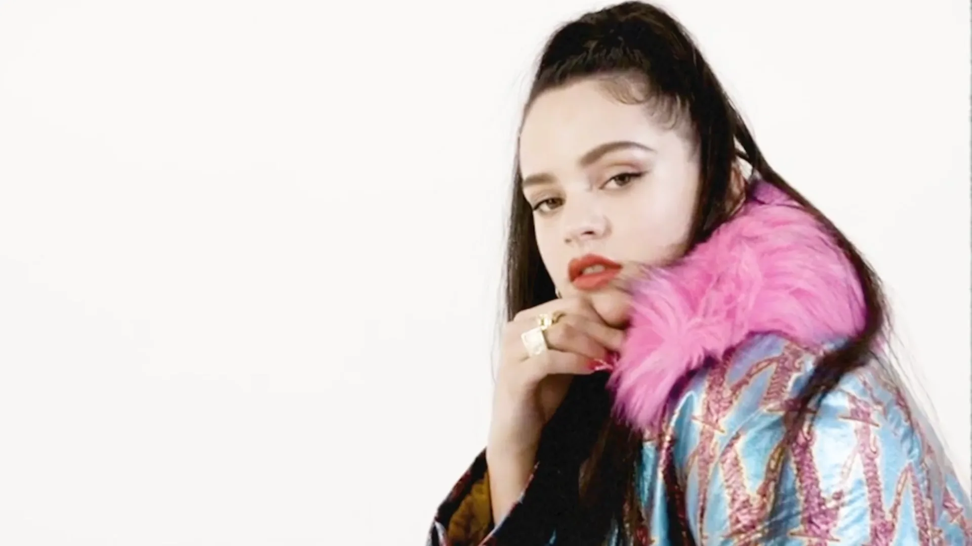 Rosalía Muses On Fashion While Showing Off Her Signature Dance Moves