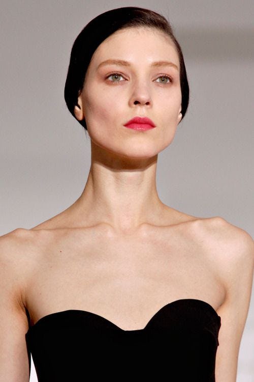 A Look Back at 10 Beauty Looks from Raf Simons’ Career