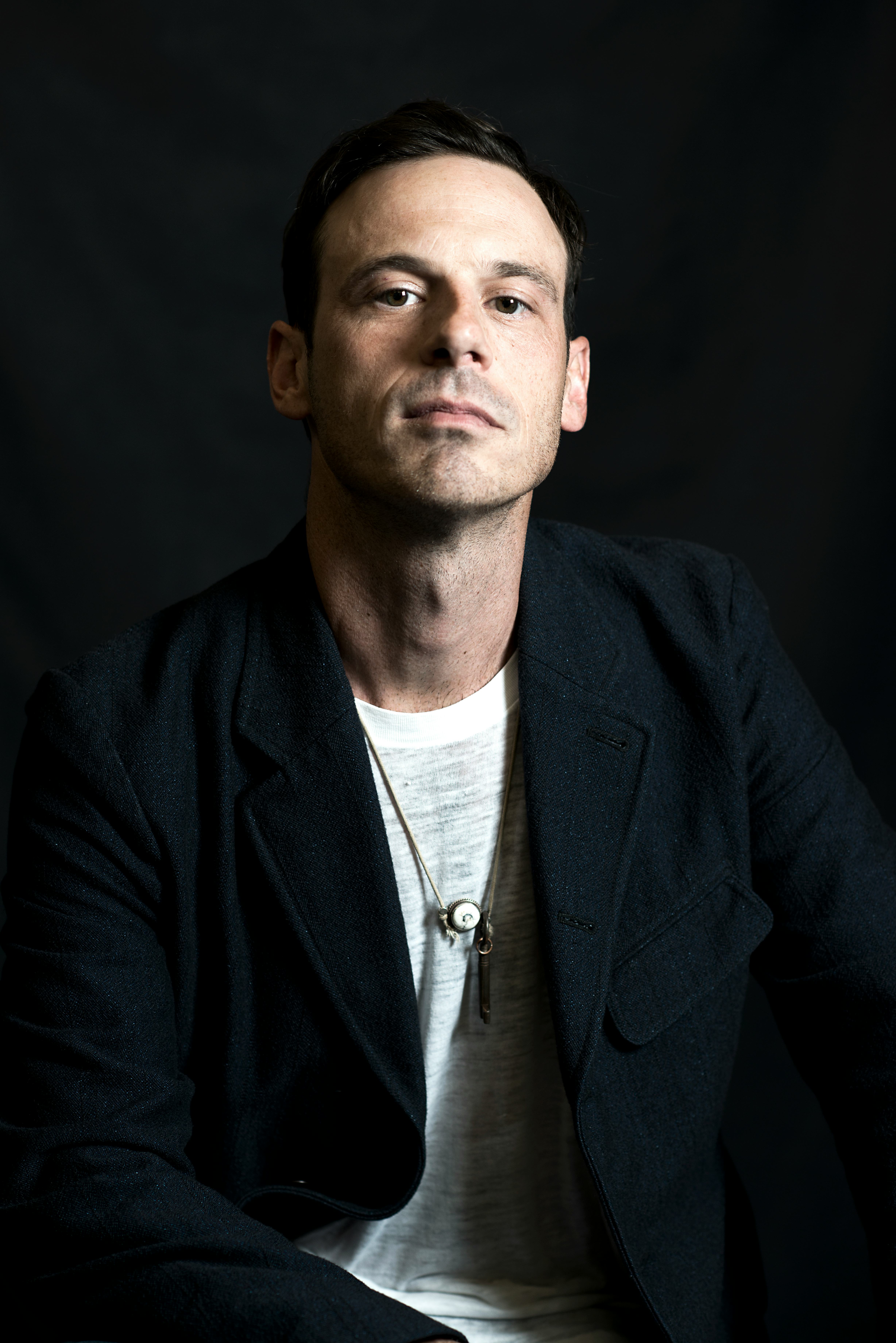 Karl Glusman Gets Dirty