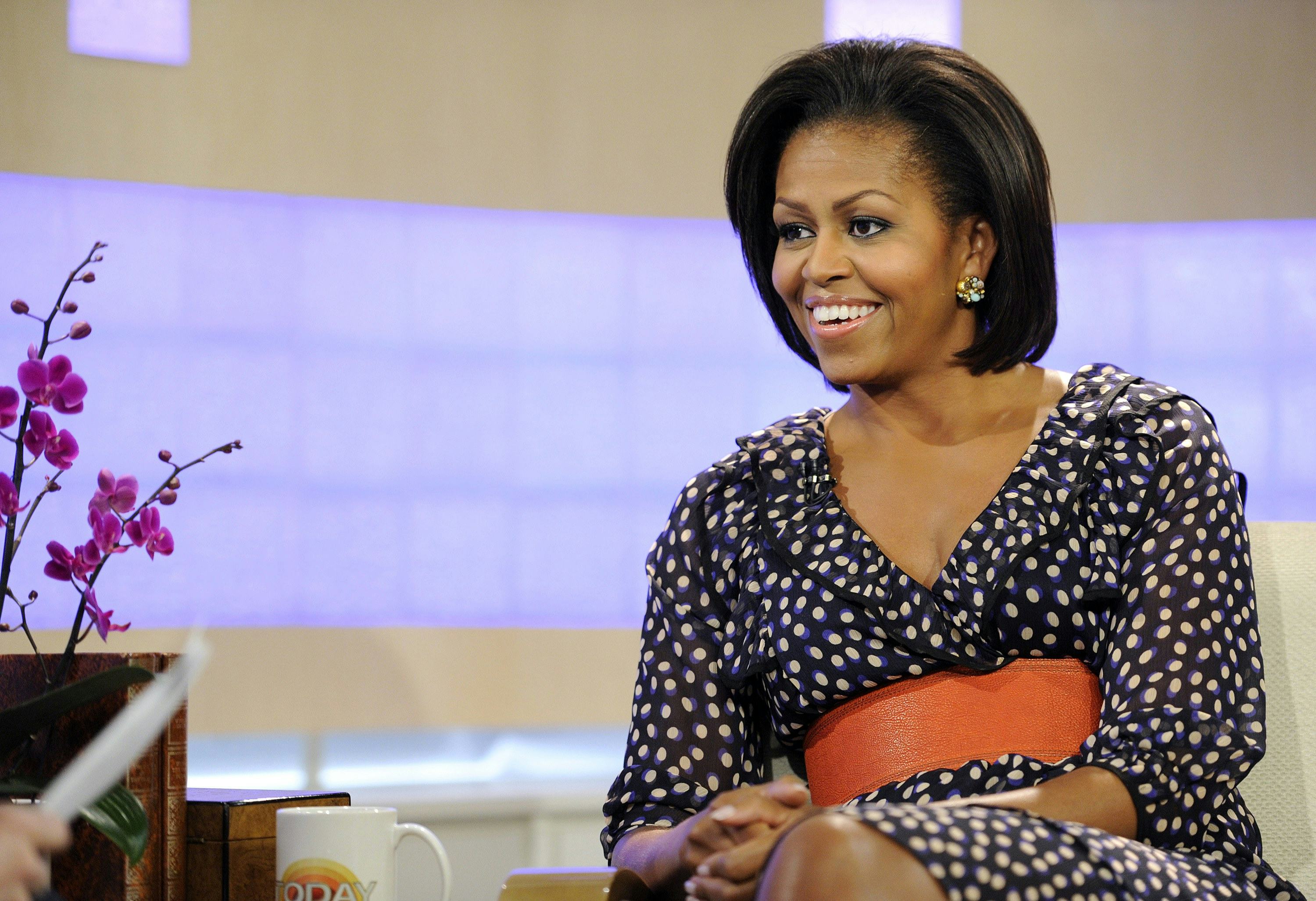 Michelle Obama and Her Hair: Celebrating Eight Years of Bangs, Curls ...