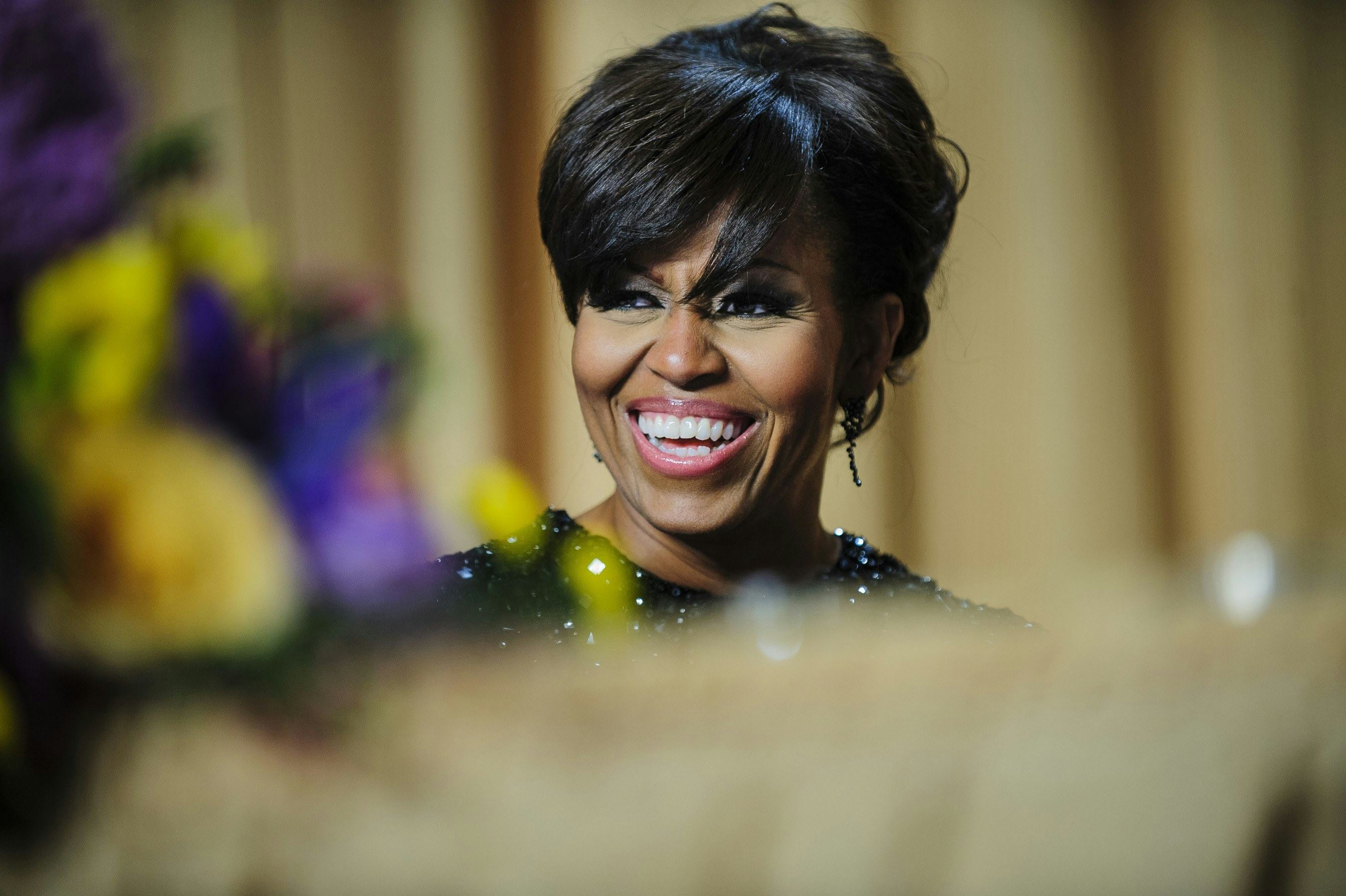 Michelle Obama and Her Hair: Celebrating Eight Years of Bangs, Curls ...