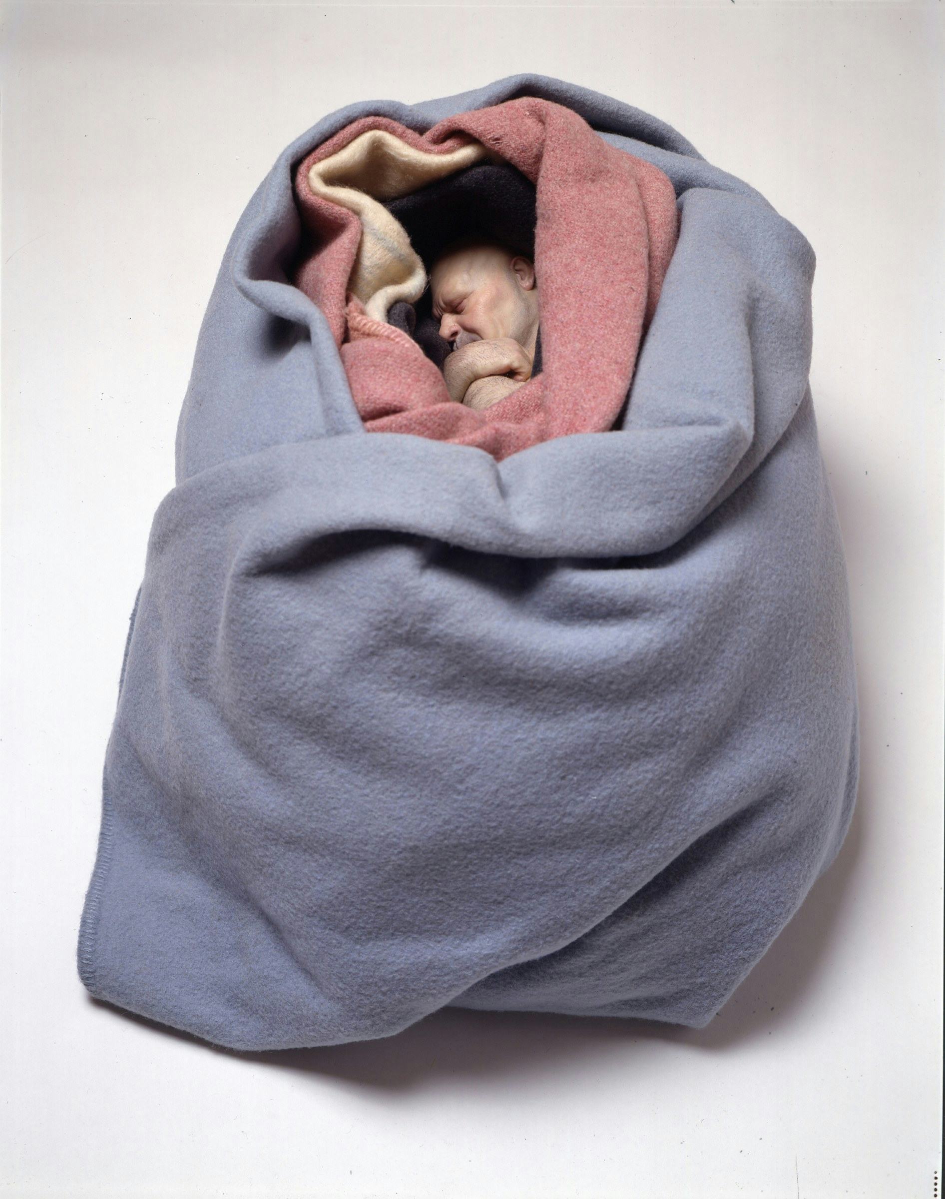 Ron Mueck’s Giant Sculptures of People Are Mesmerizing, Very Unsettling