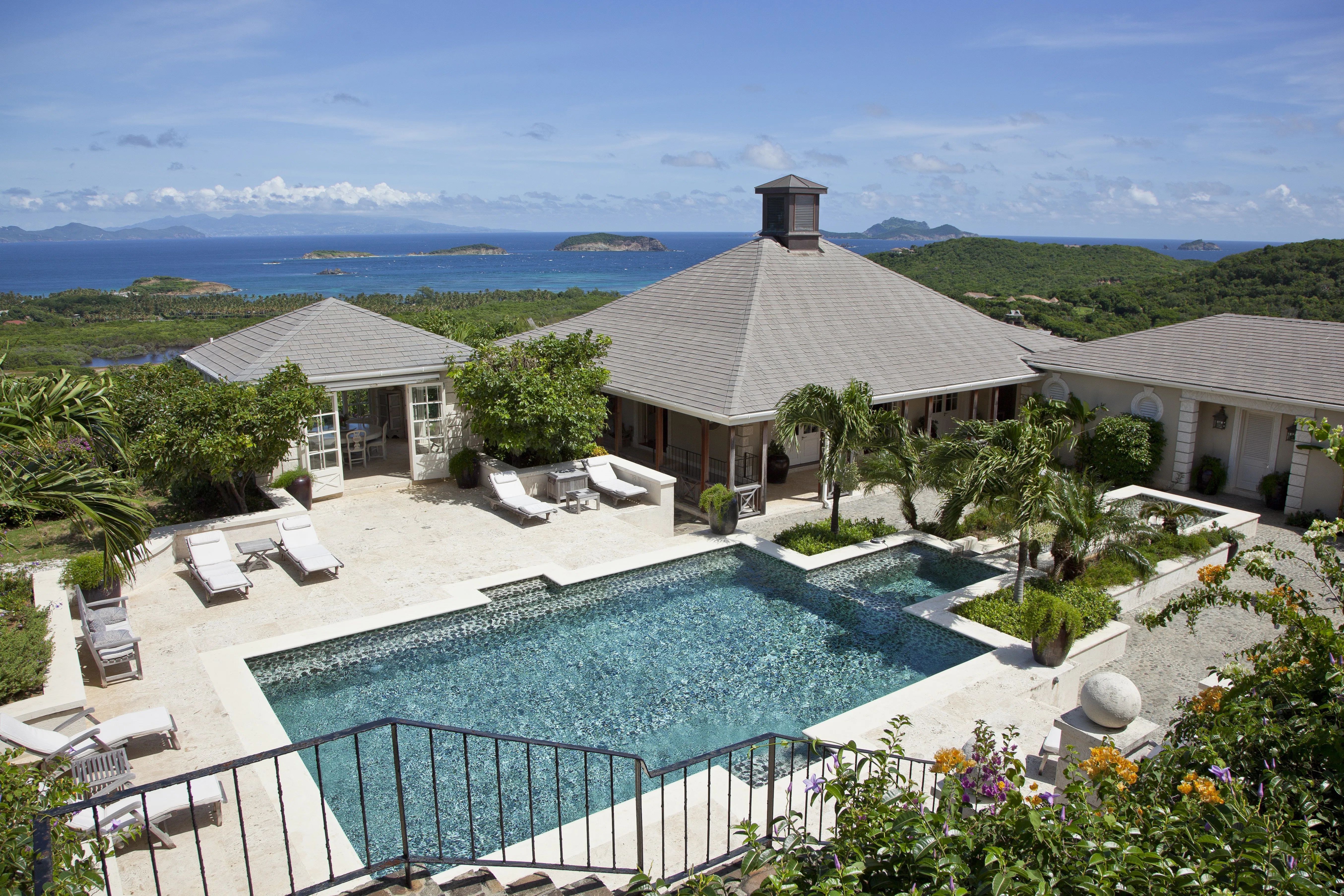 Ignore the Snowstorm and Get Lost in Images of the Best Pools of Mustique