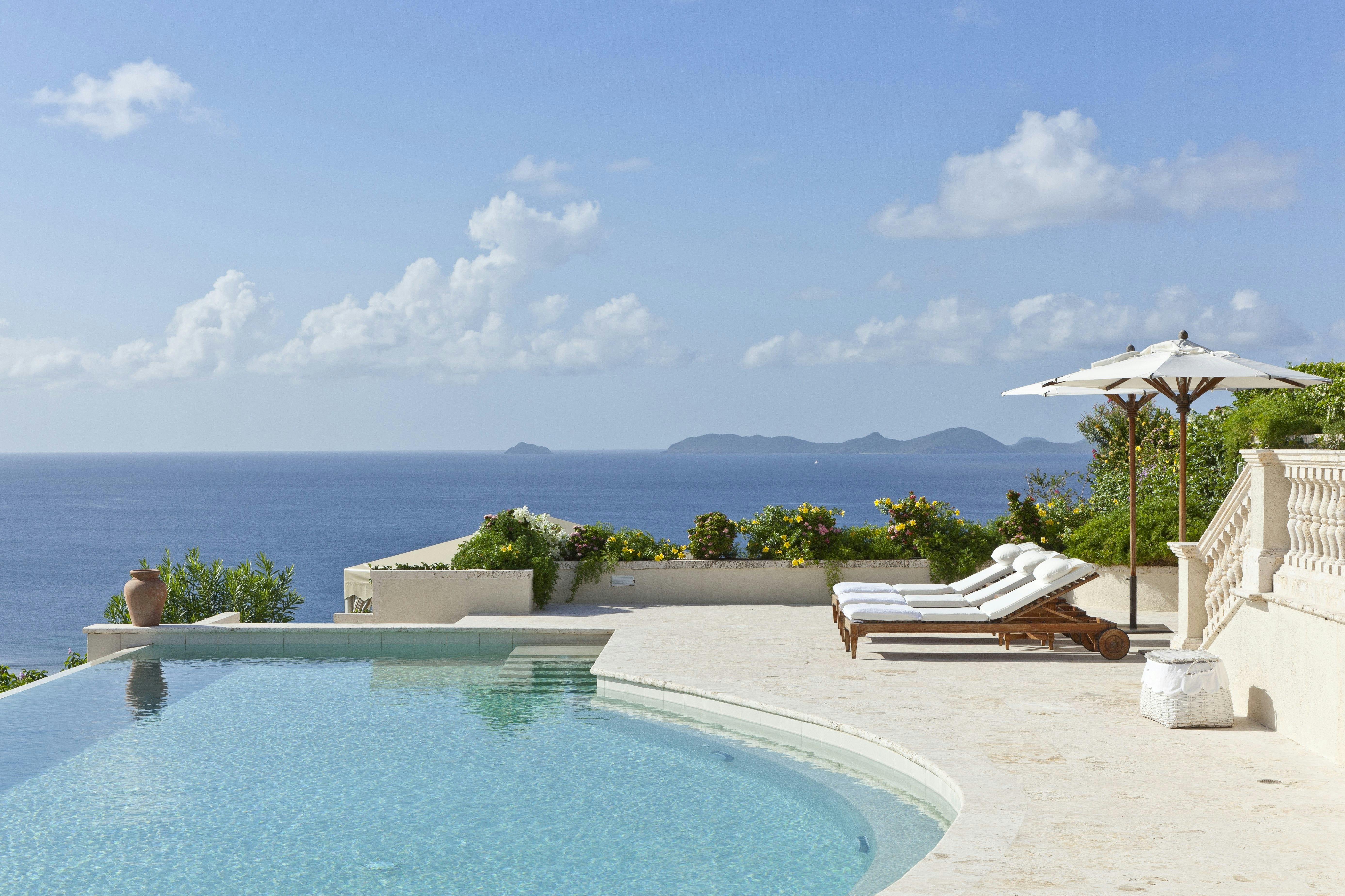 Ignore the Snowstorm and Get Lost in Images of the Best Pools of Mustique