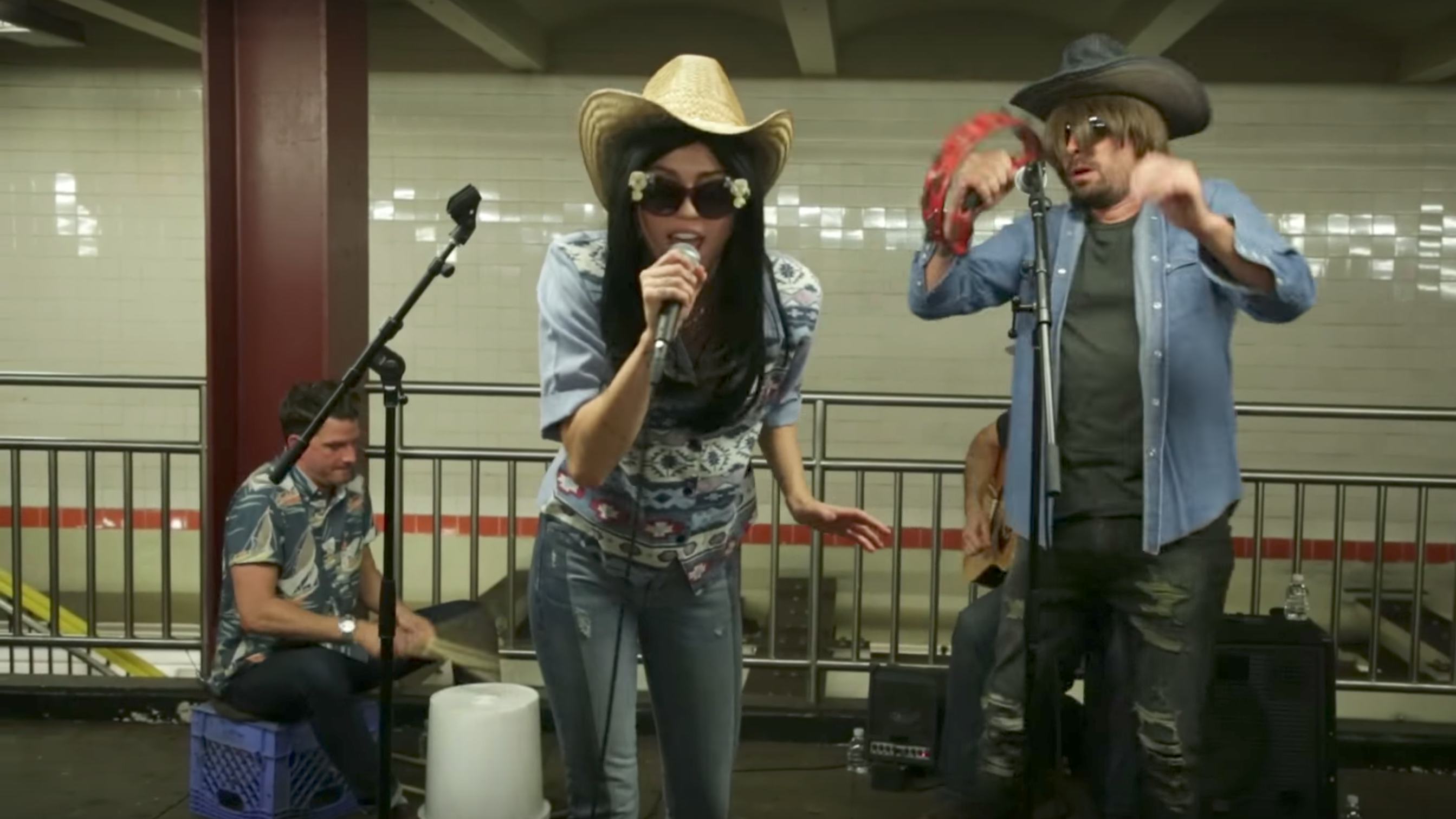 Miley Cyrus Takes Over NYC Subway to Perform in Disguise