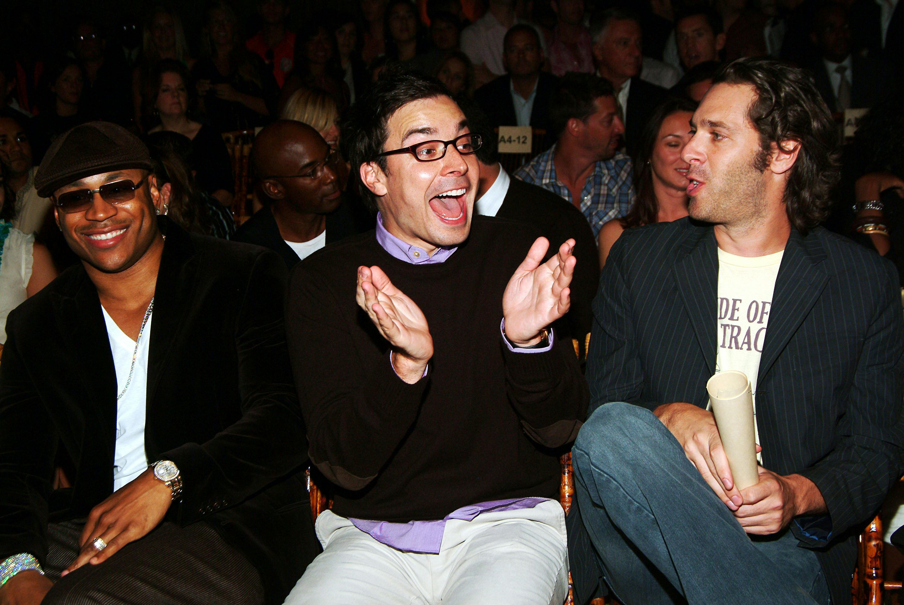 A Visual History of Male Celebrities Enjoying Fashion Shows, From ...