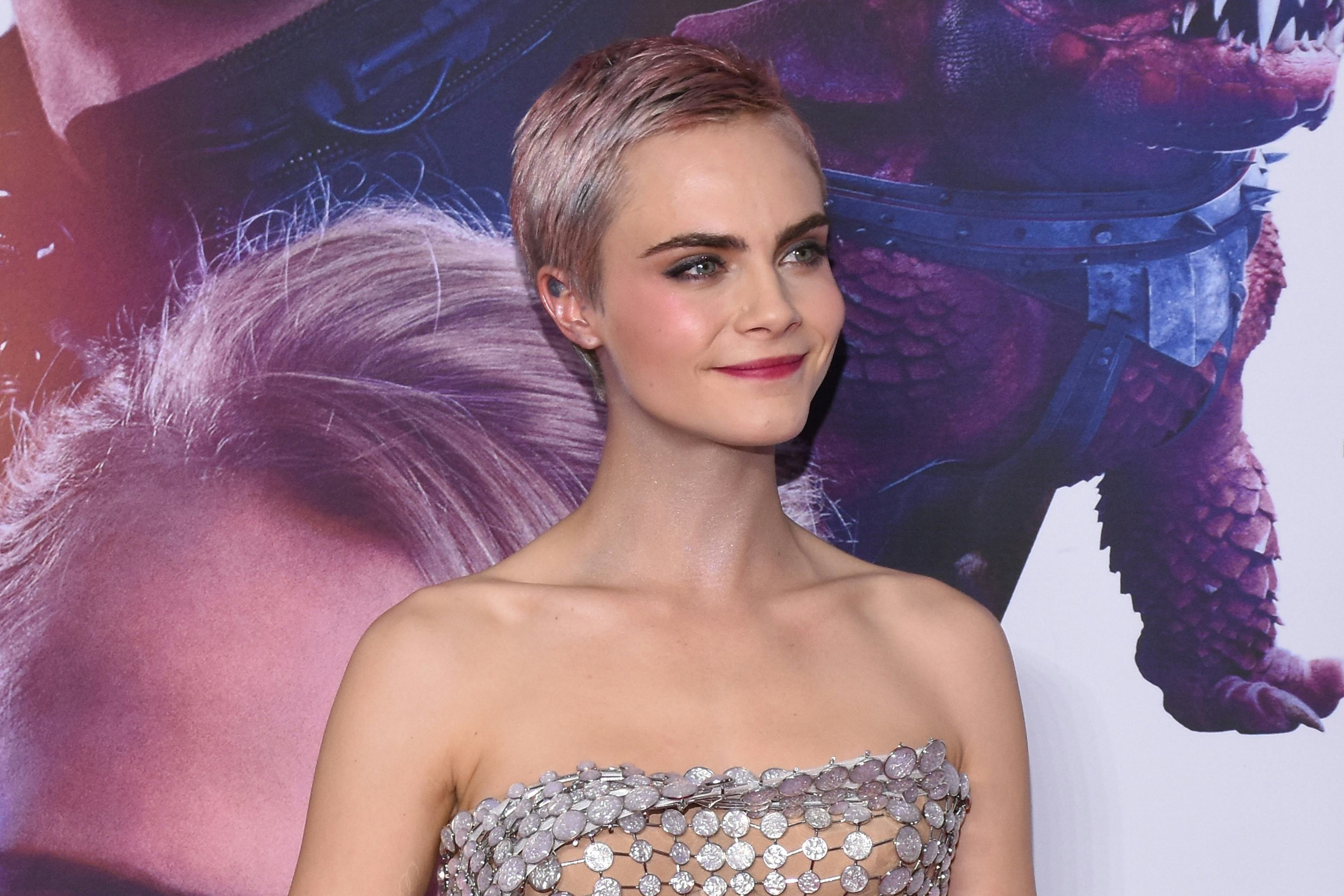 Cara Delevingne Debuts Pink Hair in Her Never Ending Quest to Have All ...