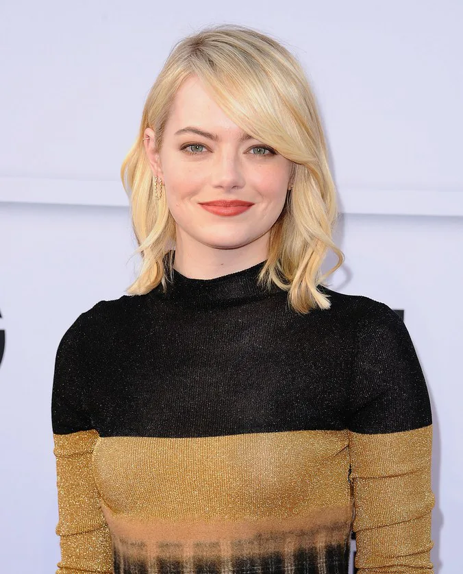 Emma Stone Just Got a Perm, Proving the ’80s Trend Is Officially “Back”