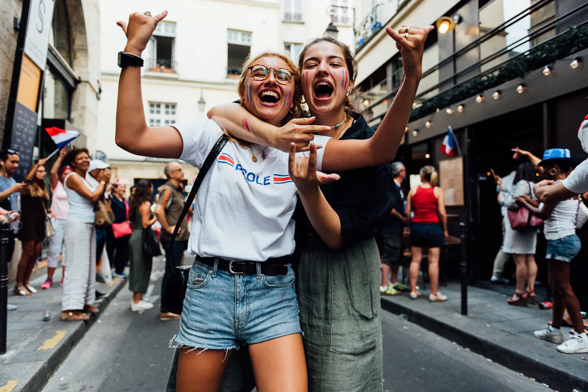 Jubilant Photos of the Wild Celebrations on the Streets of Paris After ...