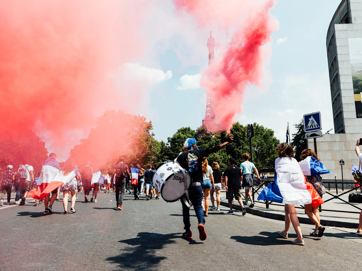 Jubilant Photos of the Wild Celebrations on the Streets of Paris After ...