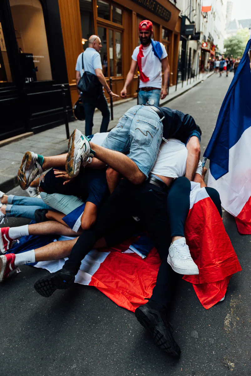 Jubilant Photos of the Wild Celebrations on the Streets of Paris After ...