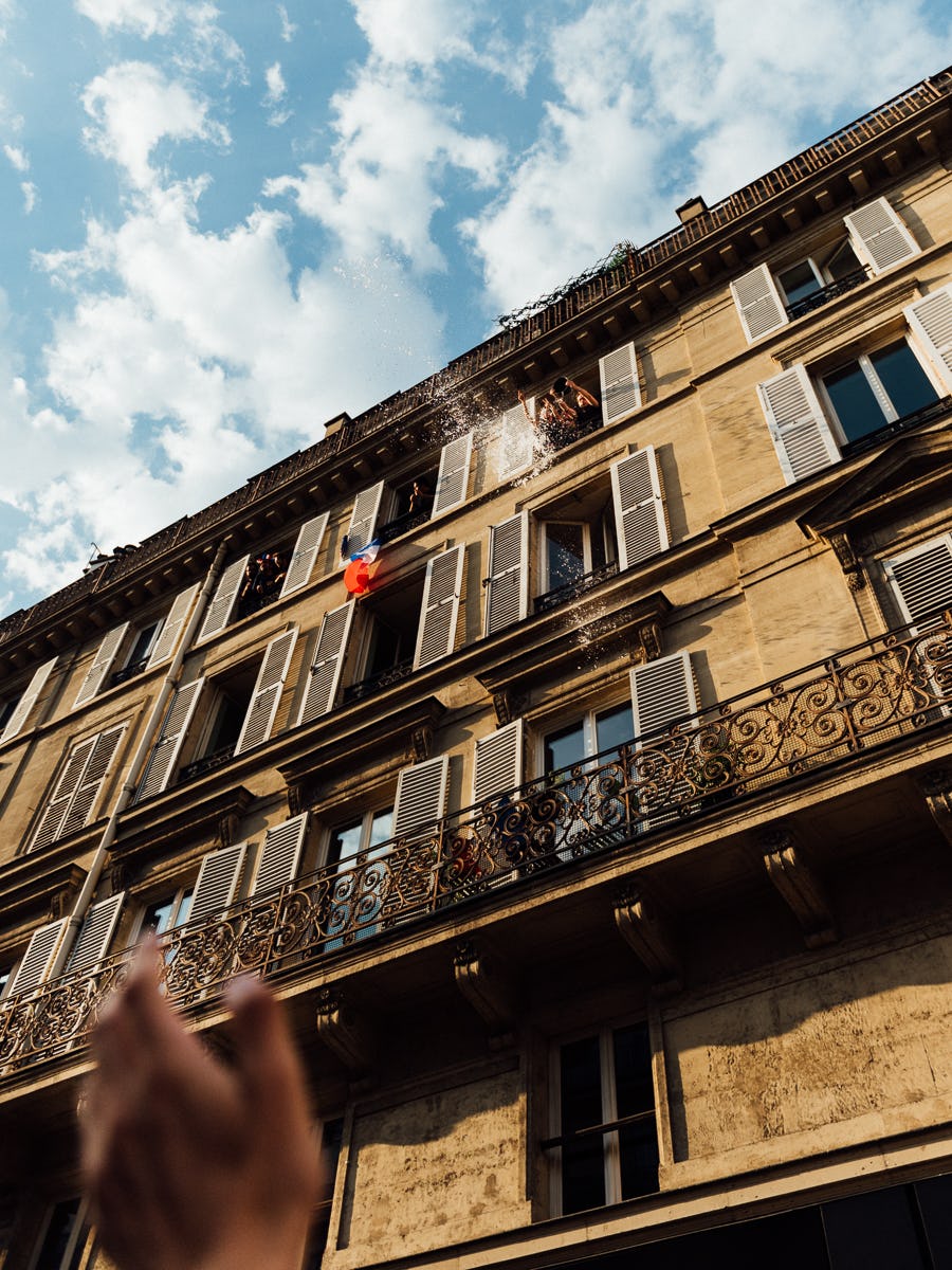 Jubilant Photos of the Wild Celebrations on the Streets of Paris After ...