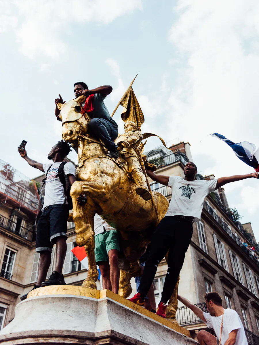 Jubilant Photos of the Wild Celebrations on the Streets of Paris After ...
