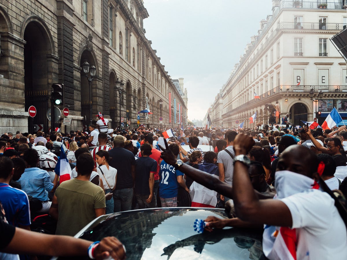 Jubilant Photos of the Wild Celebrations on the Streets of Paris After ...