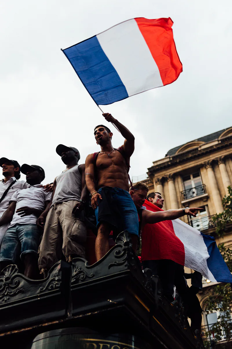 Jubilant Photos of the Wild Celebrations on the Streets of Paris After ...