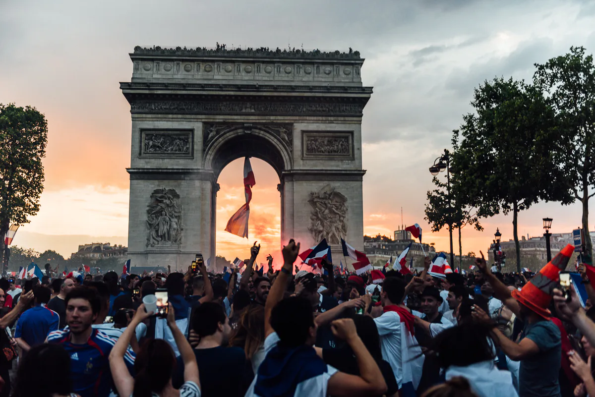 Jubilant Photos of the Wild Celebrations on the Streets of Paris After ...