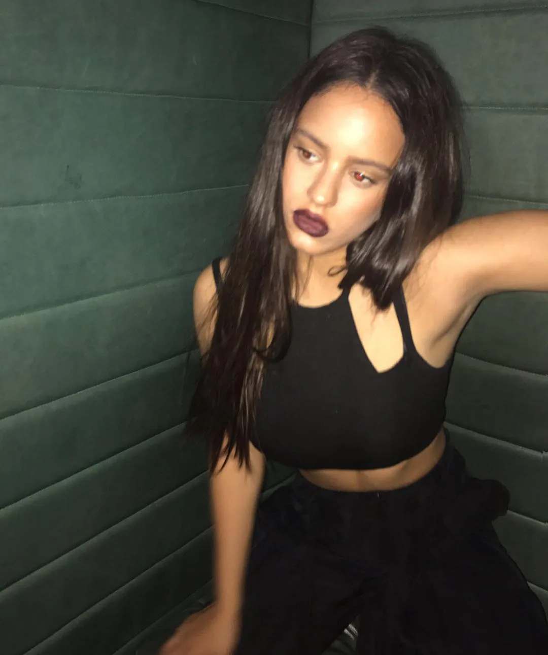 Rosalía’s Most Daring Beauty Looks, From Red Brows to Louis Vuitton Lips