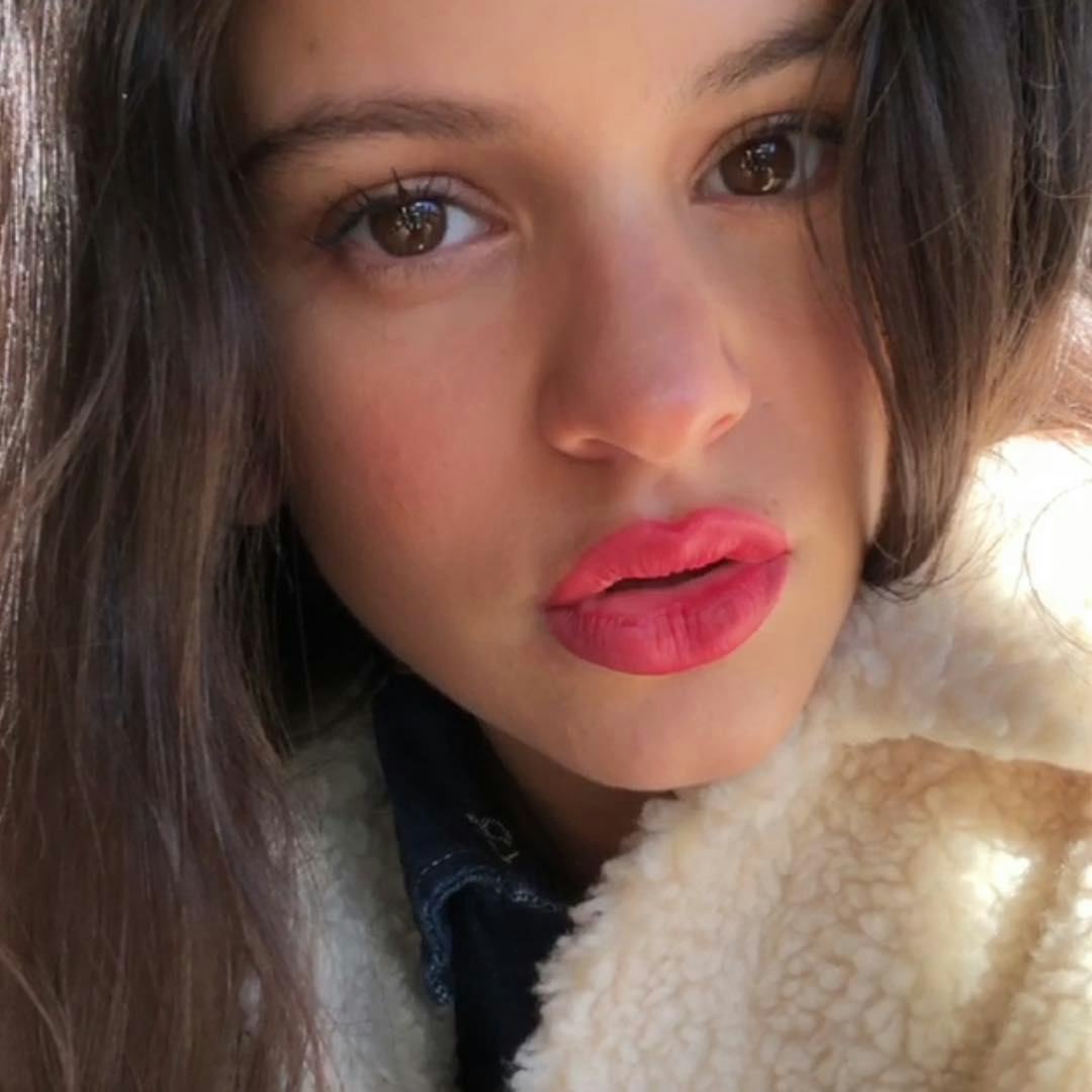 Rosalía’s Most Daring Beauty Looks, From Red Brows to Louis Vuitton Lips