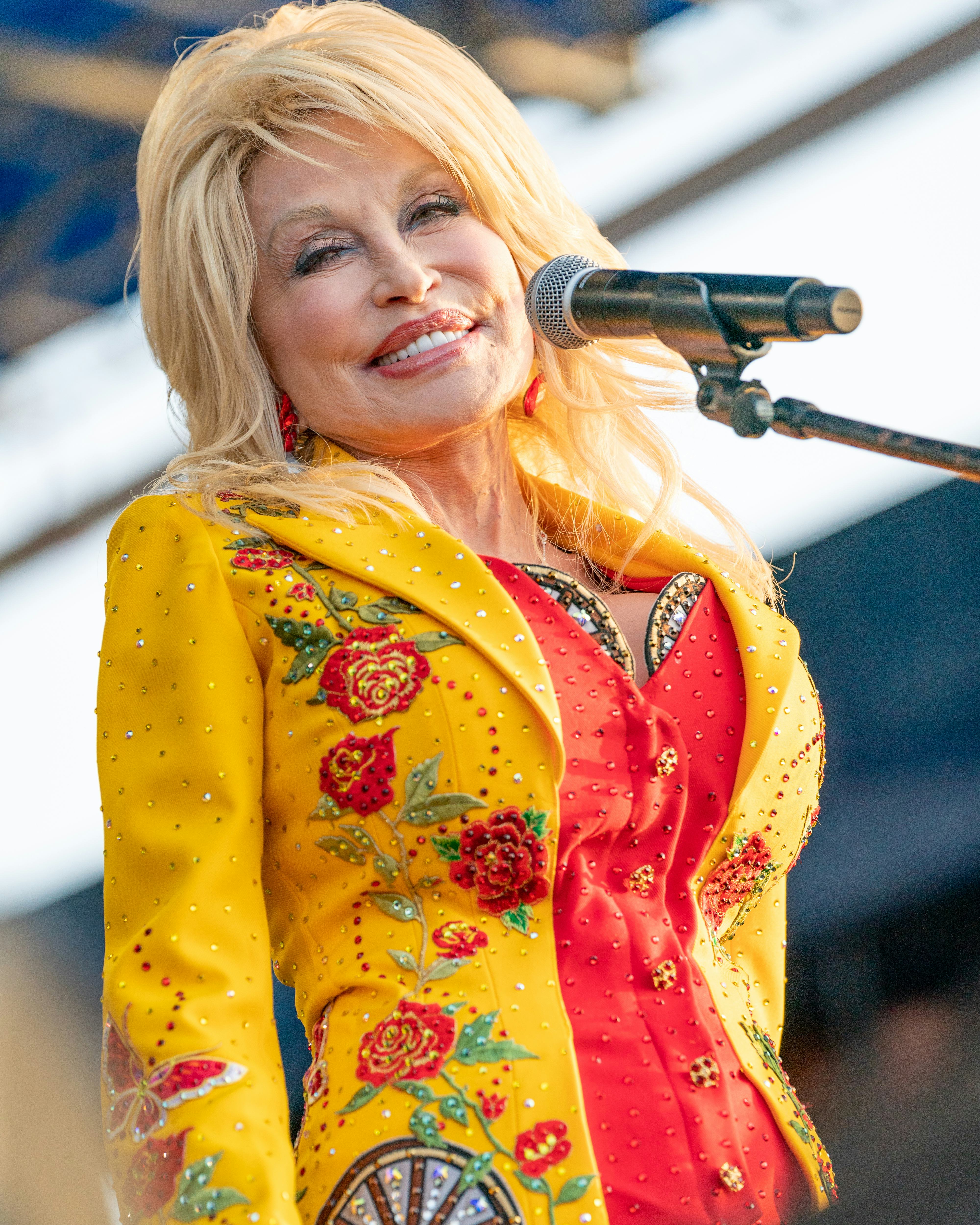 A Visual History of Dolly Parton’s Boldest Bedazzled Looks