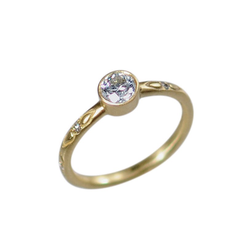 22 Diamond Engagement Rings Under $5K