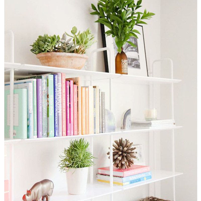 How To Make Your Cluttered Bookshelf Look Stylish