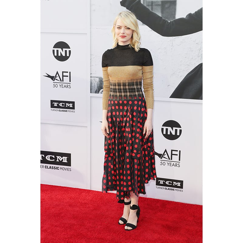 Emma Stone’s Sophisticated Dress Is An Unexpected Trend For Party Season
