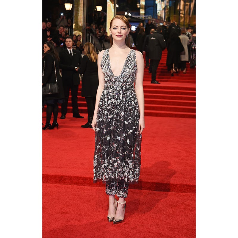 Emma Stone’s Sophisticated Dress Is An Unexpected Trend For Party Season