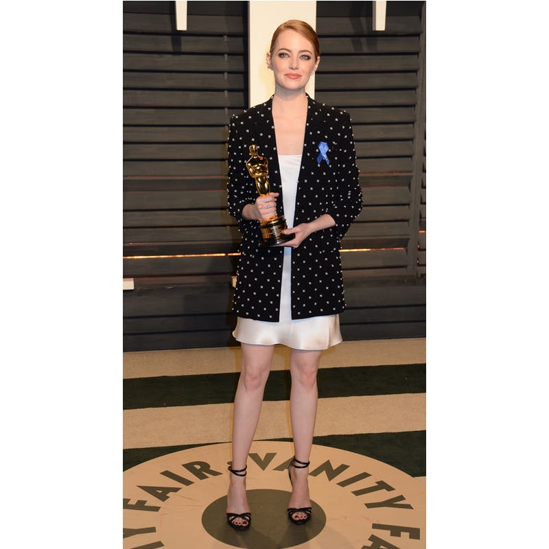 Emma Stone’s Sophisticated Dress Is An Unexpected Trend For Party Season