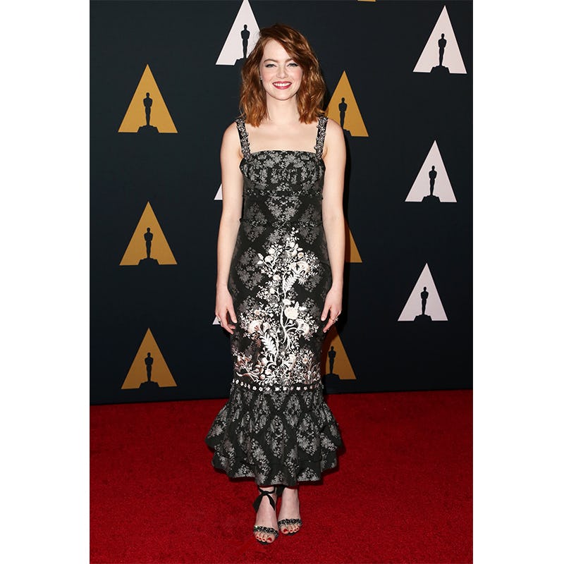 Emma Stone’s Sophisticated Dress Is An Unexpected Trend For Party Season