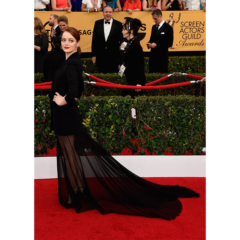 Emma Stone’s Sophisticated Dress Is An Unexpected Trend For Party Season