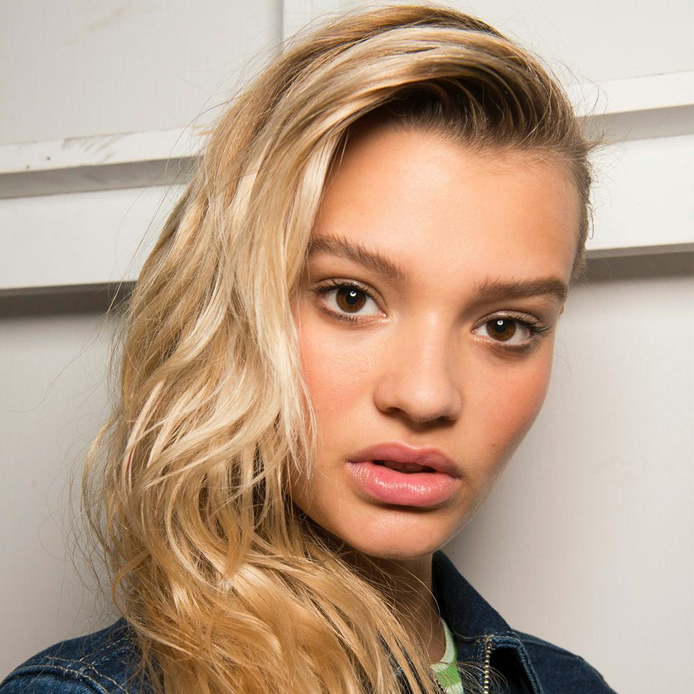 The Secret To Thicker, Fuller Hair Costs Less Than A Blowout